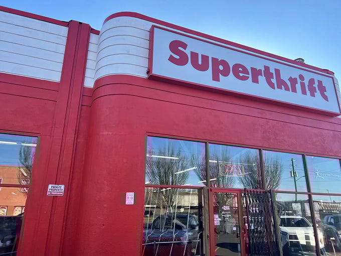 The iconic red exterior of SuperThrift stands out like a beacon of bargain-hunting hope in Salem's retail landscape.
