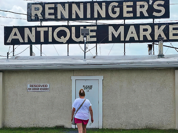 The iconic Renninger's sign glows against a Pennsylvania sunset, beckoning treasure hunters like a Vegas marquee for the vintage-obsessed.