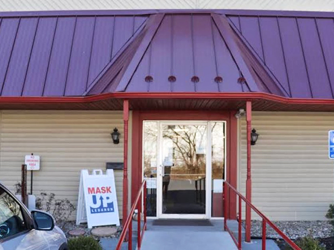 The unassuming exterior of Jubilee Thrift belies the wonderland within—like finding a portal to treasure hunting heaven behind that distinctive burgundy awning.