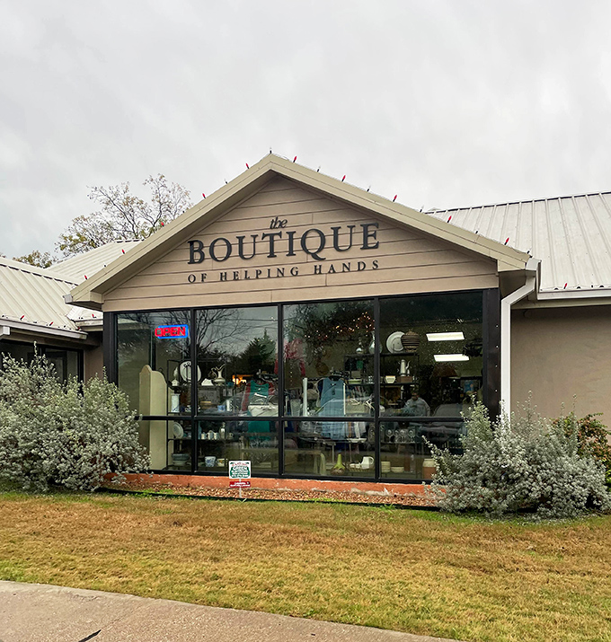 The unassuming exterior of Helping Hands Boutique hides a treasure trove within—like finding a secret passage to bargain heaven in suburban Rockwall.