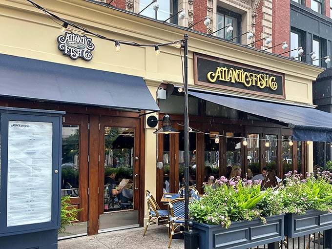 The golden facade of Atlantic Fish Company stands out on Boylston Street like a beacon for seafood lovers—nautical elegance in Boston's Back Bay.