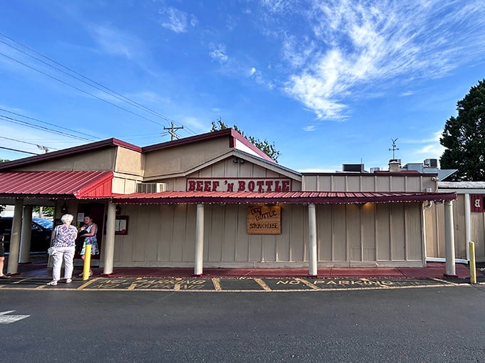 The red awning and vintage signage serve as a beacon for steak lovers. Like finding a vinyl record store in the age of streaming—authentically old-school and proud of it.