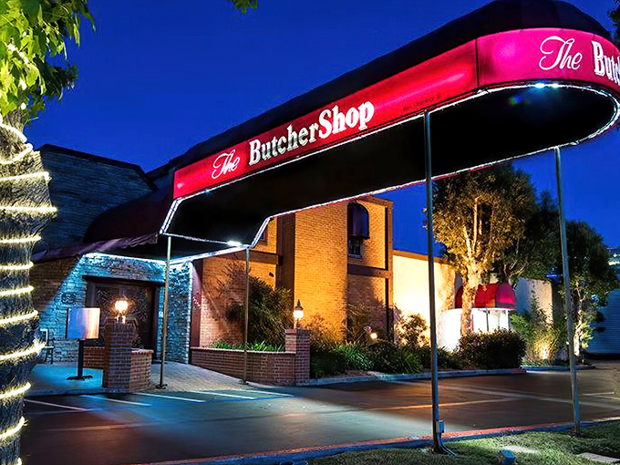 The brick façade and burgundy awning of The Butcher Shop stand ready to welcome hungry patrons. Like a carnivore's lighthouse beckoning you to safe harbor.
