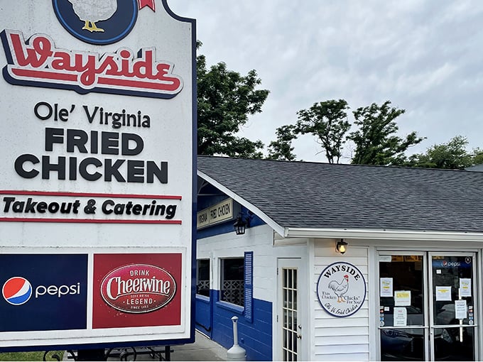 The iconic Wayside sign promises "Ole' Virginia Fried Chicken" – a humble declaration that locals know isn't just marketing, but a delicious guarantee.