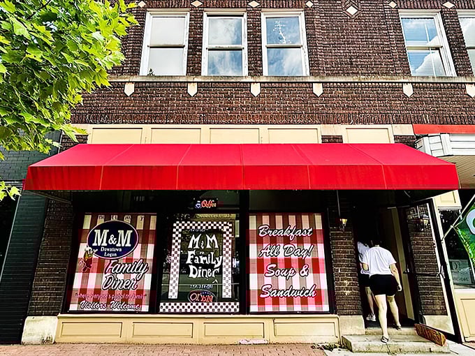 The red and white checkered storefront isn't just decoration—it's a promise of the homestyle comfort that awaits inside. Breakfast all day? Yes, please!