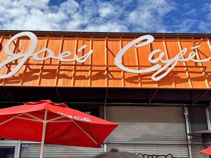 The unmistakable orange facade of Joe's Cafe stands out against the Utah sky, like a beacon calling hungry breakfast enthusiasts home.