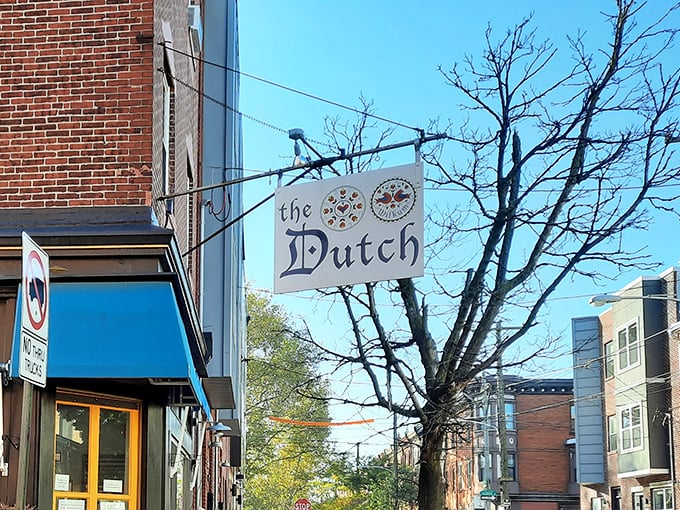 The iconic blue-and-white striped awning and simple hanging sign announce The Dutch without fanfare – like a secret handshake for breakfast aficionados.