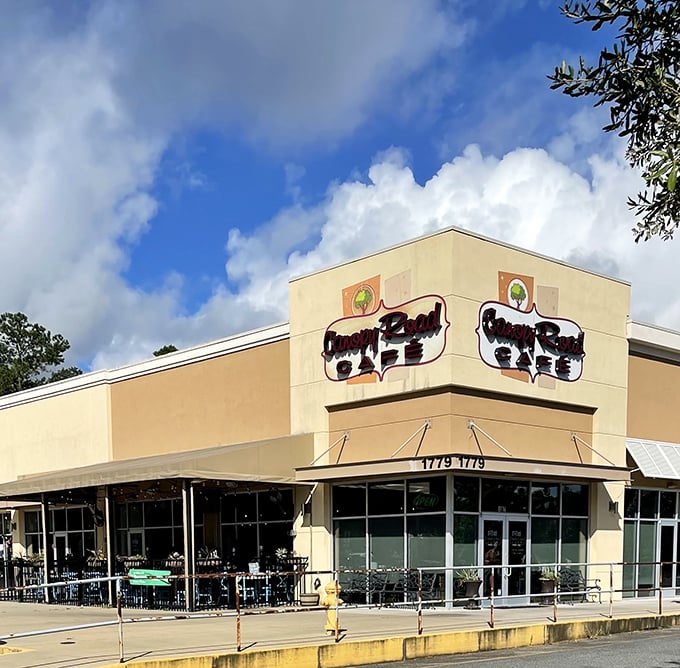 The unassuming exterior of Canopy Road Cafe stands like a breakfast beacon against Florida's blue sky, promising comfort food that'll make your taste buds dance.