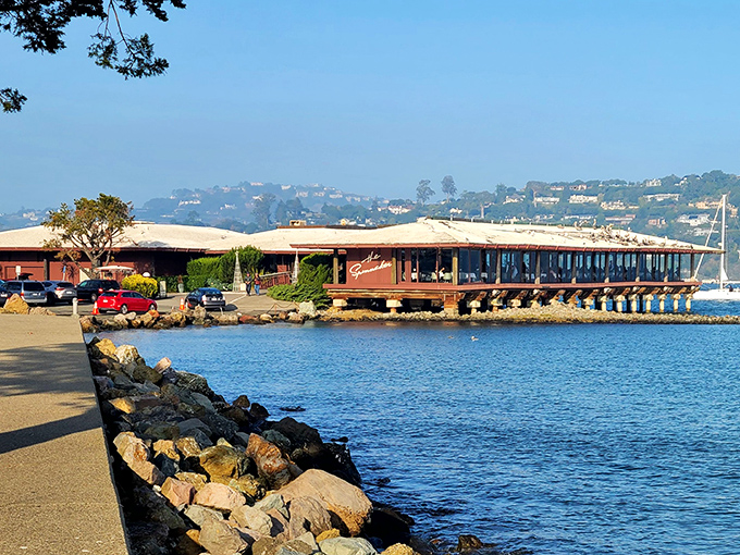 From this angle, you can see why locals call it "that restaurant on the water" – because it's literally ON the water, with the bay lapping beneath your feet.