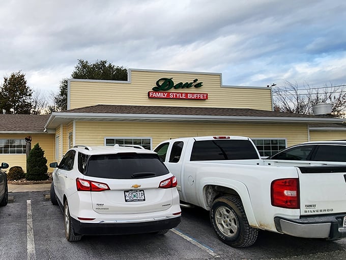Where pickup trucks and sedans gather like faithful disciples, drawn by the siren call of perfectly fried catfish and country hospitality.