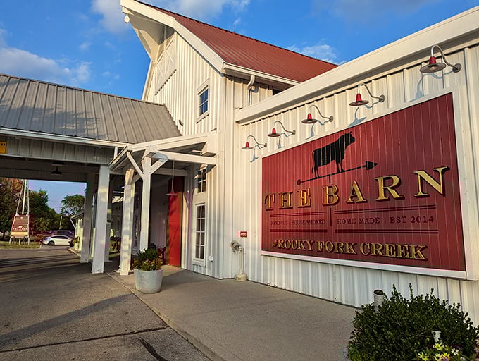 The iconic white barn exterior with its striking red accents isn't just Instagram-worthy—it's a beacon calling hungry Ohioans home to flavor country.