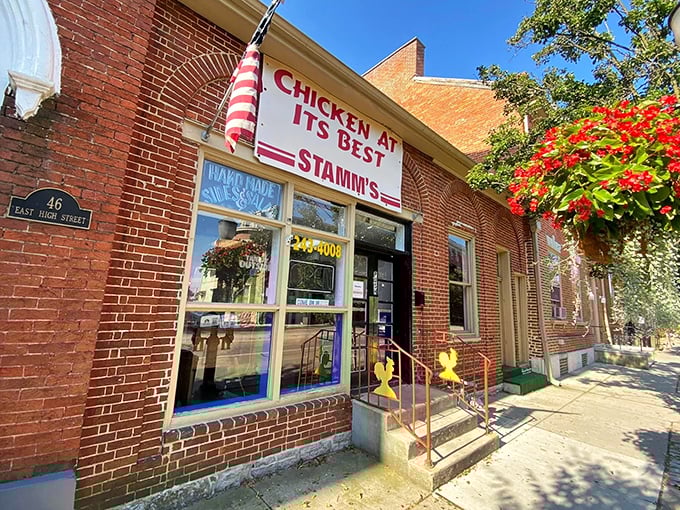 The iconic "Chicken At Its Best" sign promises exactly what you'll find inside Grandma Stamm's brick-fronted treasure.
