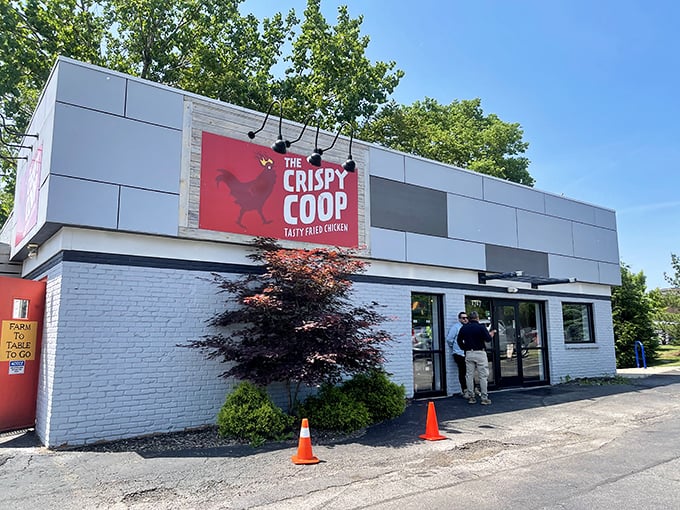 The Crispy Coop's modern white exterior with its bold red rooster logo promises chicken nirvana in Columbus's Grandview Heights neighborhood.