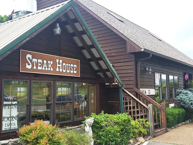 No pretentious valet parking here—just a straightforward "Steak House" sign promising exactly what you're craving after a day in the Smokies.