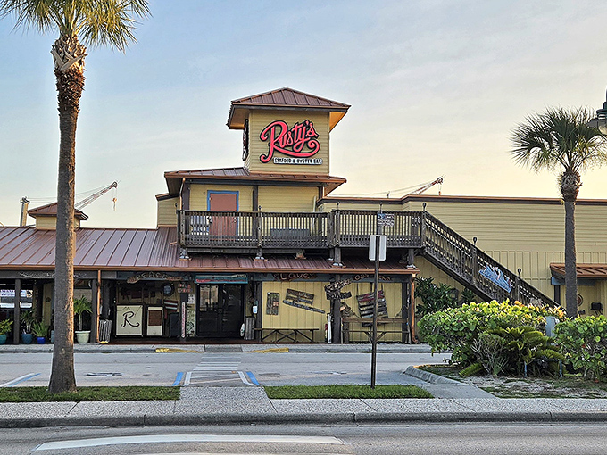 "The sunshine-yellow exterior of Rusty's stands like a beacon for seafood lovers, promising Florida flavors without the fuss or pretension."