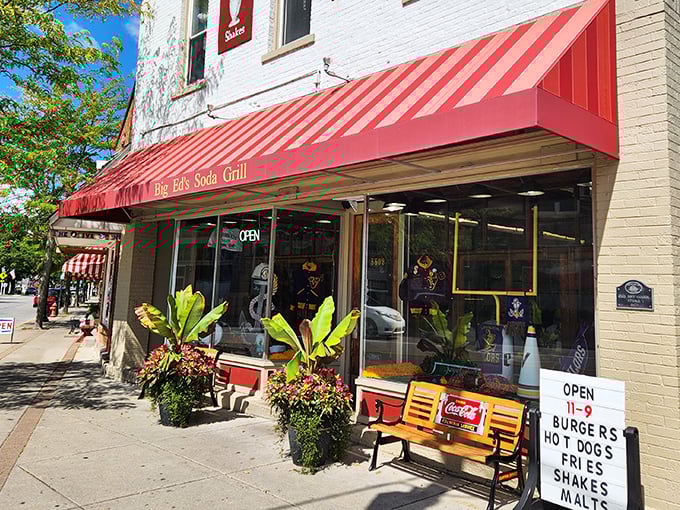 That wooden Coca-Cola bench isn't just street furniture—it's Vermilion's unofficial waiting room where strangers become friends while anticipating the perfect malt.