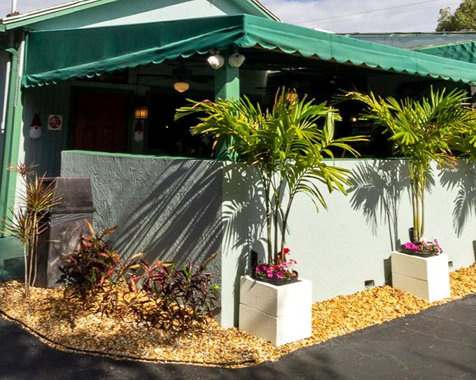 That green awning isn't just shade—it's a beacon calling seafood lovers to their happy place.