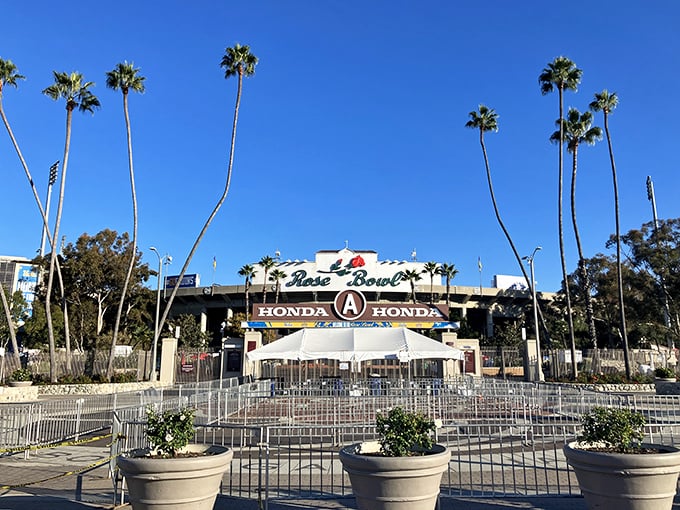 The iconic Rose Bowl Stadium, framed by swaying palm trees against that perfect California blue sky, transforms into treasure-hunter heaven once a month.
