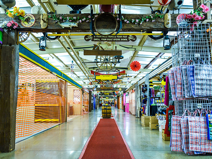 The iconic red and white entrance to Traders World beckons treasure hunters with its distinctive horse silhouettes—Ohio's retail rodeo where bargains await.