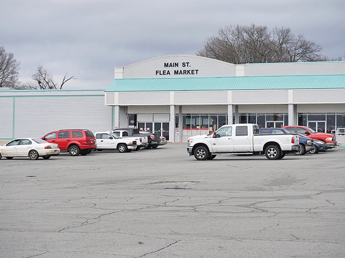 Under cloudy Arkansas skies, this retail time machine stands ready. The full parking lot tells you what locals already know—this place is worth stopping for.