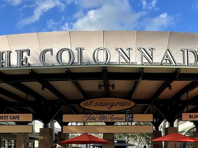 Those palm trees aren't just for show – they're providing shade for shoppers plotting their next bargain conquest.