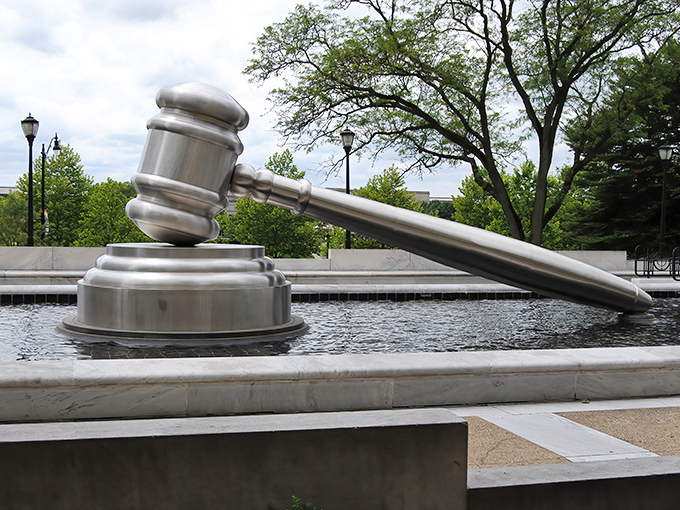 Justice gets supersized! The World's Largest Gavel gleams majestically in its reflecting pool, making even the most serious legal eagles crack a smile.
