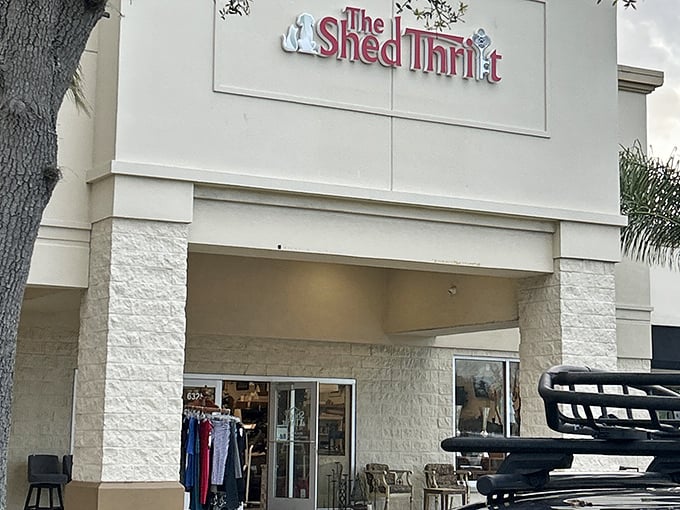 The white façade of The Shed Thrift stands like a beacon of bargain-hunting hope, promising treasures within that your wallet will thank you for.