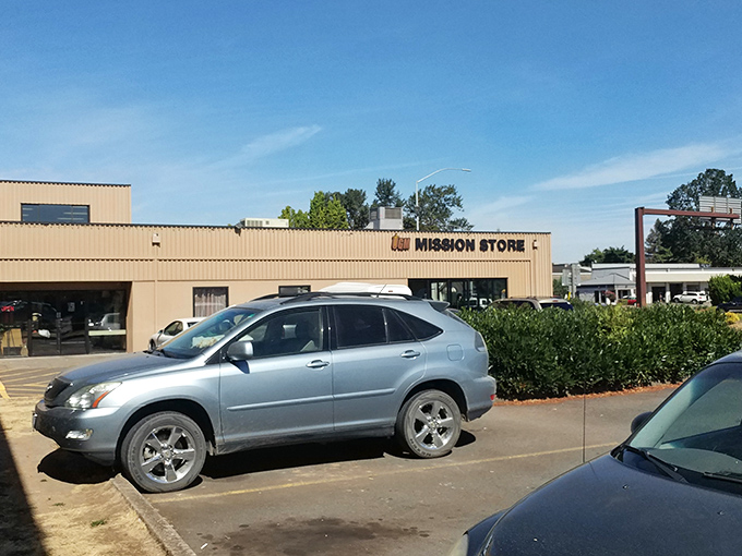 The unassuming exterior of Union Gospel Mission Store in Salem – where treasures hide behind a no-nonsense façade that says "bargains inside!"