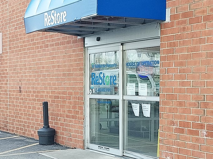 The simple brick exterior of Habitat’s ReStore might not shout for attention, but step inside and it’s a hidden trove of deals—like stumbling onto a secret stash of savings in plain sight.