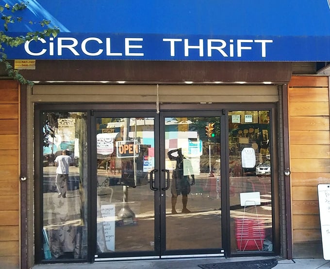 The colorful exterior of Circle Thrift Too beckons from a Philadelphia street corner, promising treasures within its unassuming walls.