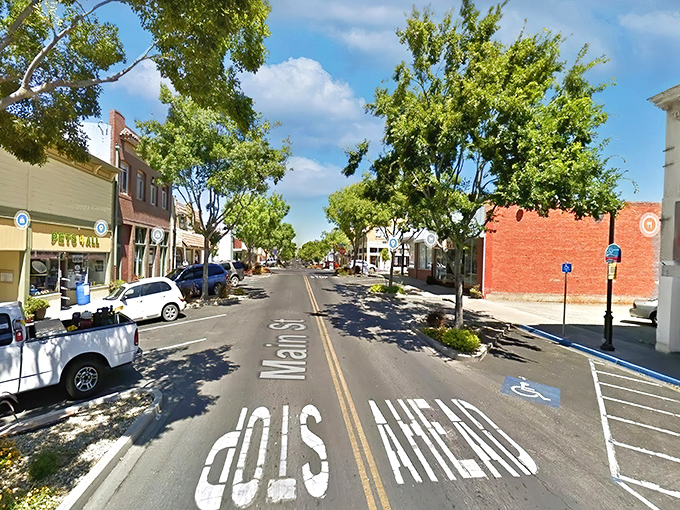 Main Street simplicity at its finest – where small-town charm meets California sunshine, and parking spots are still plentiful enough to make city dwellers weep with envy.