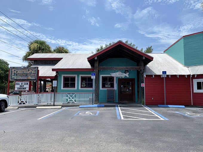 That cheerful green and red exterior might look humble, but it's hiding some serious seafood magic inside.