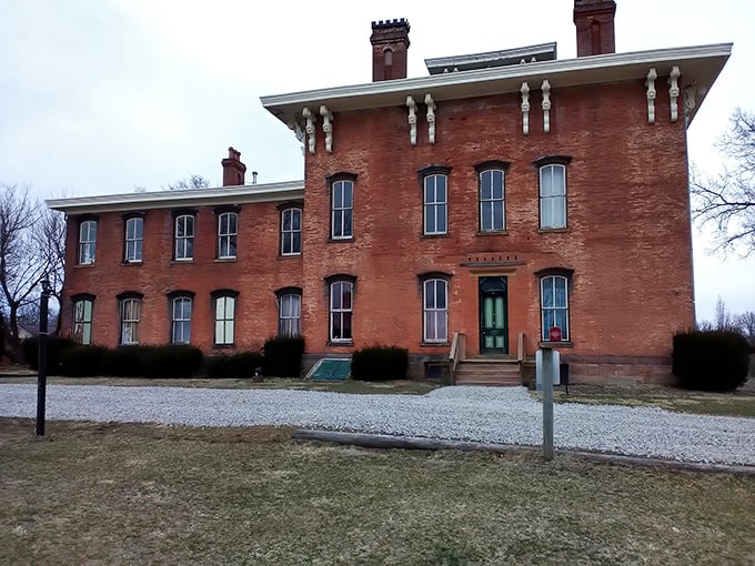 This towering brick fortress commands attention like a Victorian-era celebrity – impossible to ignore and absolutely unforgettable.