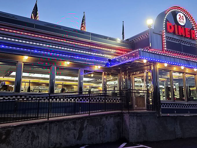 The neon glow of Blue Colony Diner at dusk isn't just a beacon for hungry travelers—it's Connecticut's chrome-plated love letter to American dining tradition.