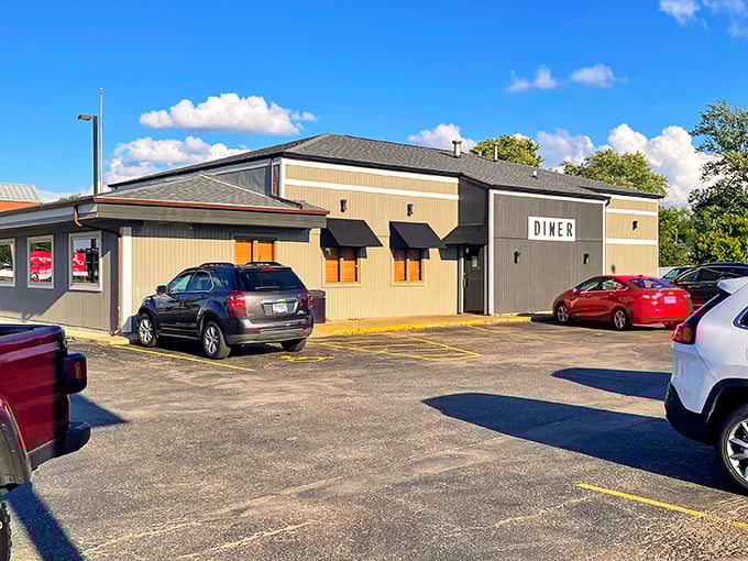 Another angle reveals the diner's straightforward charm—no pretentious frills, just the promise of honest food that keeps the parking lot filled with loyal patrons.