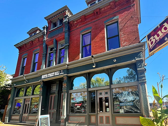 The historic brick façade of Ninth Street Deli @ Howard's promises culinary treasures within. St. Louis sandwich seekers, your quest ends here.