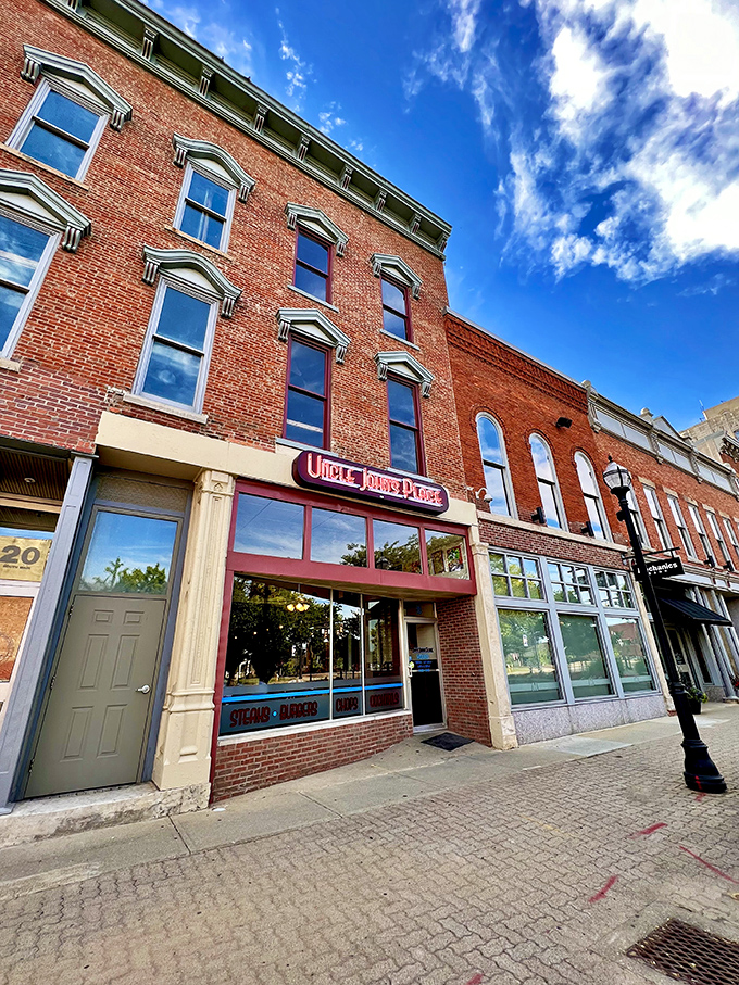 The historic brick façade of Uncle John's Place stands proudly on Mansfield's main strip, a culinary beacon that's been drawing hungry pilgrims for generations.