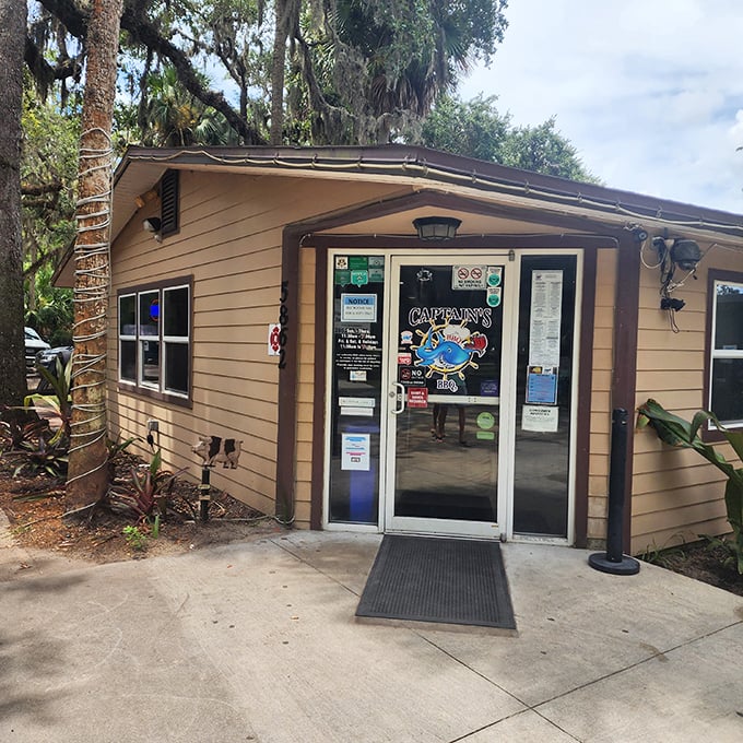 The entrance to barbecue nirvana. This simple doorway leads to one of Florida's most celebrated BBQ spots, where smoke signals promise delicious things ahead.
