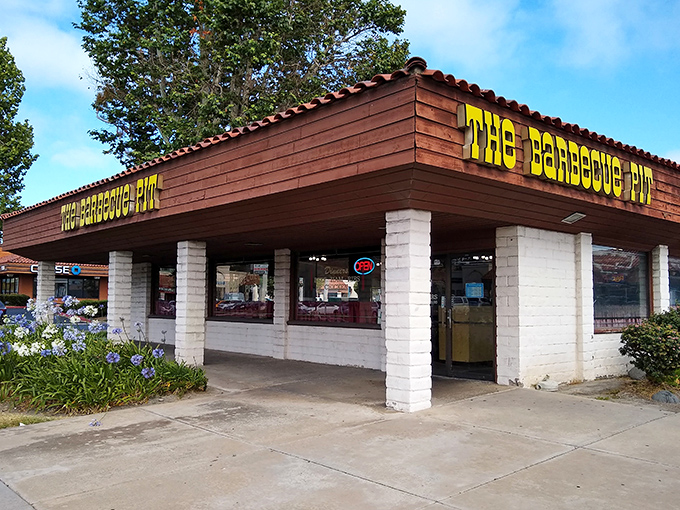 The unassuming exterior of The Barbecue Pit stands as a testament that culinary greatness doesn't need flashy signage—just decades of smoke-infused expertise.