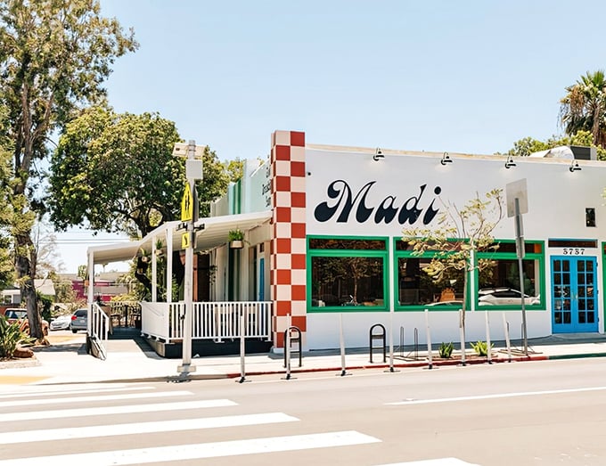 The classic white exterior with vibrant green trim makes Madi look like the California breakfast joint that time forgot—in the best possible way.