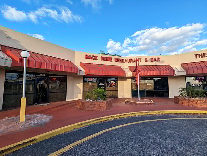 Those red awnings aren't just decoration – they're basically a beacon calling hungry souls to wing paradise.