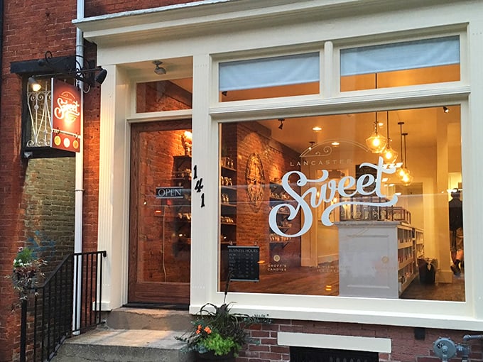 The glowing storefront of Lancaster Sweet Shoppe beckons like a lighthouse for sugar-seekers on Duke Street.