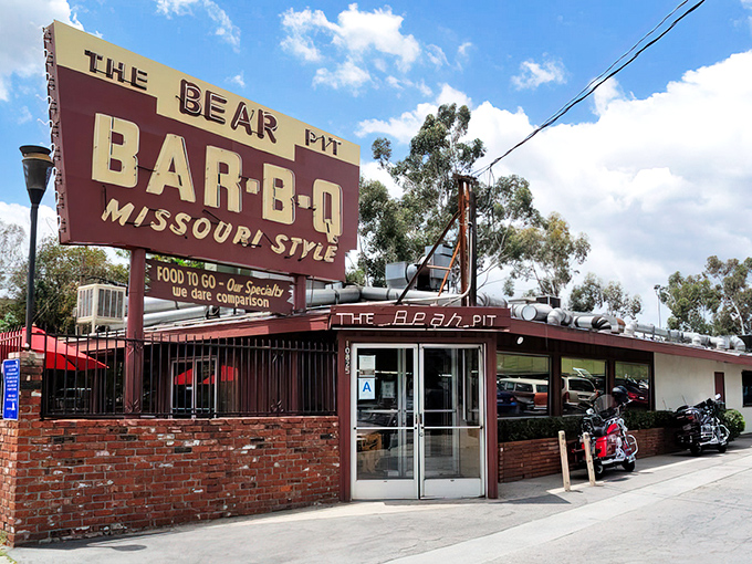 That iconic burgundy and cream sign has been beckoning hungry travelers on Sepulveda Boulevard for decades. Some landmarks are made of marble; the best ones are made of neon and promise barbecue.