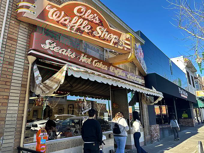 That iconic neon sign beckons like an old friend – Ole's Waffle Shop has been Alameda's breakfast beacon since long before brunch became trendy.