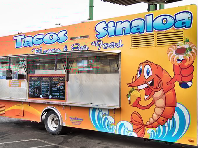 The bright orange truck with its cartoon shrimp mascot isn't just eye-catching—it's a beacon of taco perfection on International Boulevard that's worth every mile of the journey.