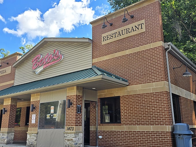 The brick-and-mortar home of pizza rebellion, where Beto's iconic neon sign has been beckoning Pittsburgh pizza pilgrims for decades.