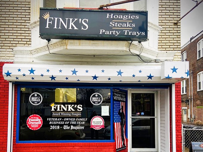 The unassuming storefront with its patriotic blue-starred awning stands like a sandwich sentinel in Northeast Philly. Awards proudly displayed hint at the treasures within.