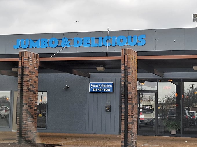 The blue sign beckons like a lighthouse for the hungry—Jumbo & Delicious isn't trying to be fancy, just fantastic.