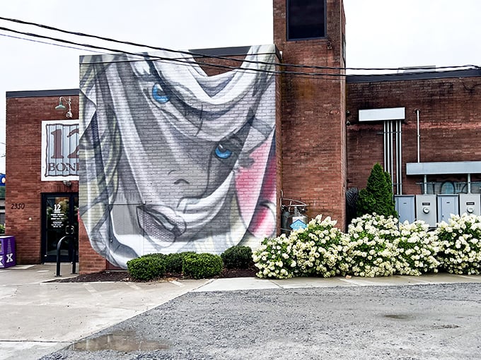The brick fortress of flavor beckons with its striking mural – 12 Bones isn't just a restaurant, it's Arden's smoke signal to serious barbecue pilgrims.