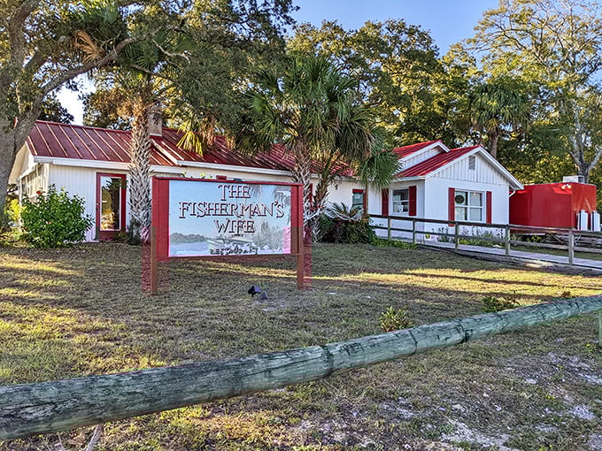 The little white cottage with the bright red roof isn't trying to impress anyone—until you taste what's cooking inside. Florida's hidden seafood treasures often come in the most unassuming packages.